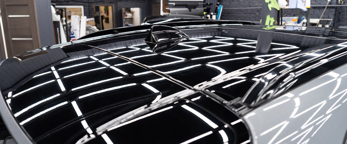 Roof wrapping: cut off extra vinyl with knife – Teckwrap International